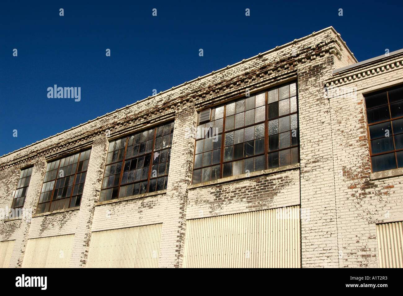 Run down industrial building Stock Photo - Alamy