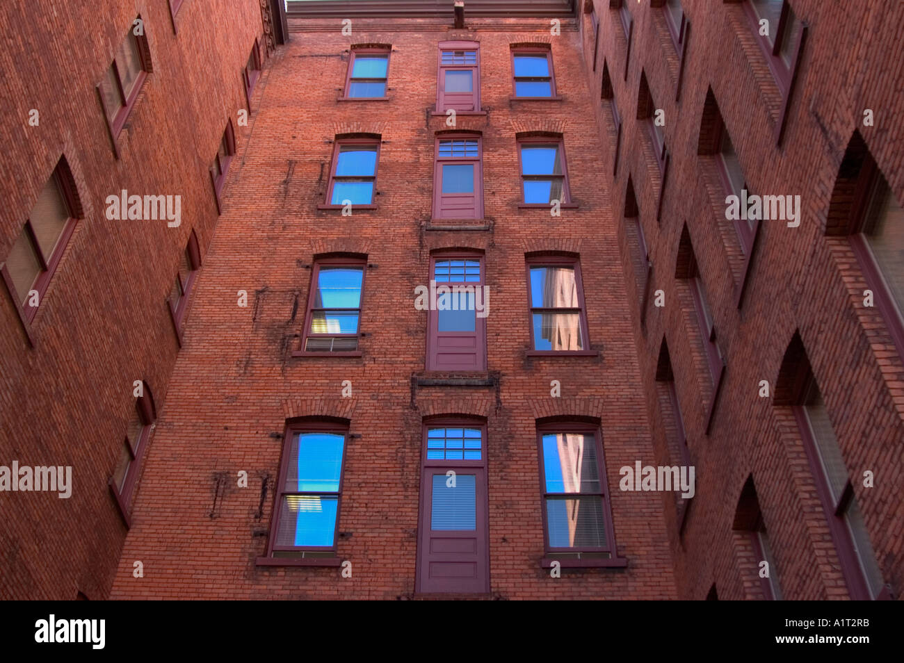 Red brick buildings with windows Stock Photo - Alamy