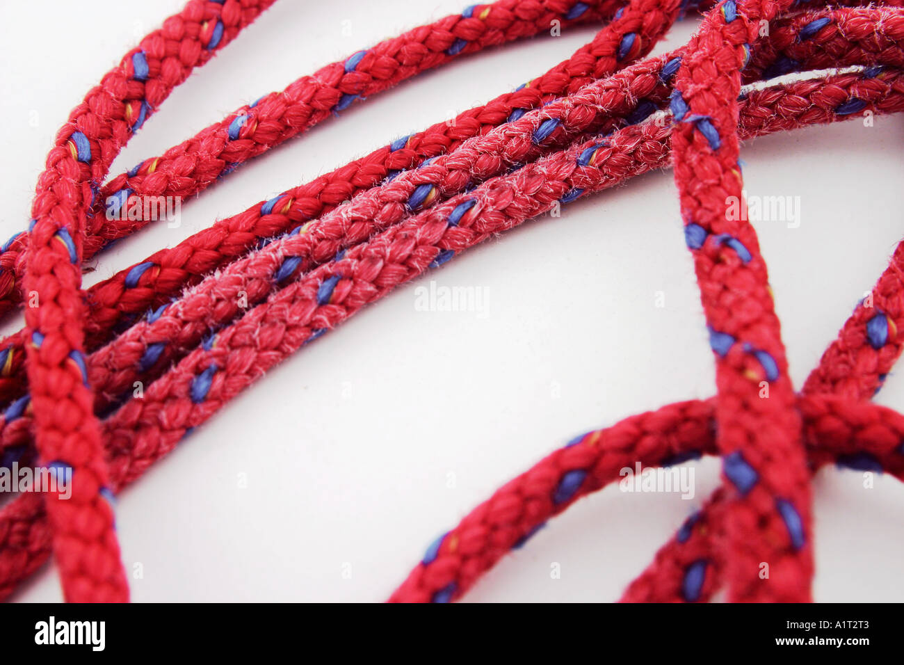 Red tangled rope Stock Photo - Alamy