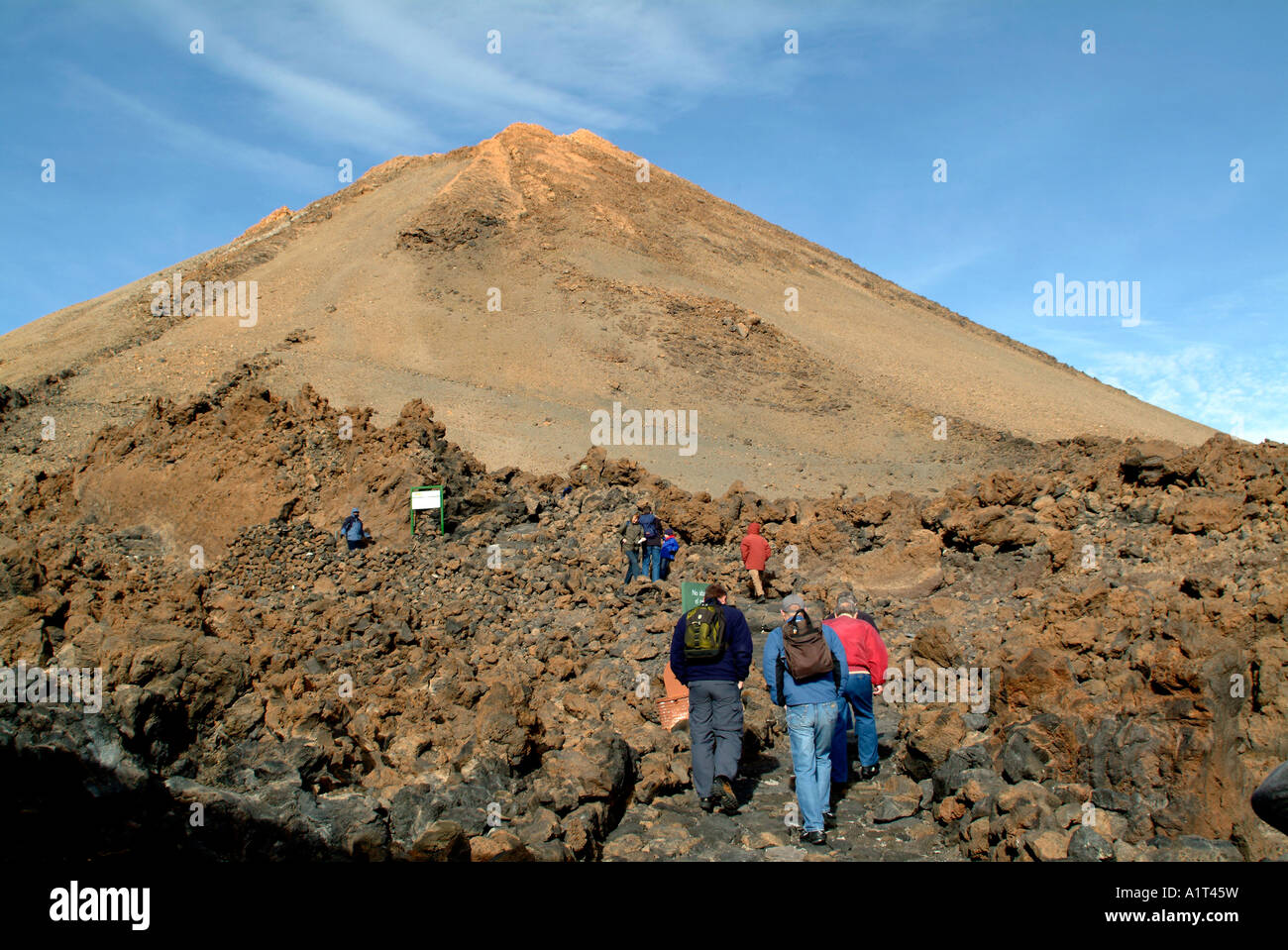 People climbing the Lava from Mount Teide Stock Photo - Alamy