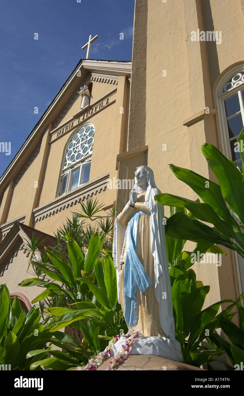 Praying figure in front of Maria Lanakila Catholic church, Lahaina ...
