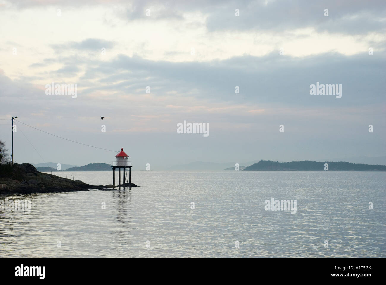 Sea view with lighthouse Stock Photo - Alamy