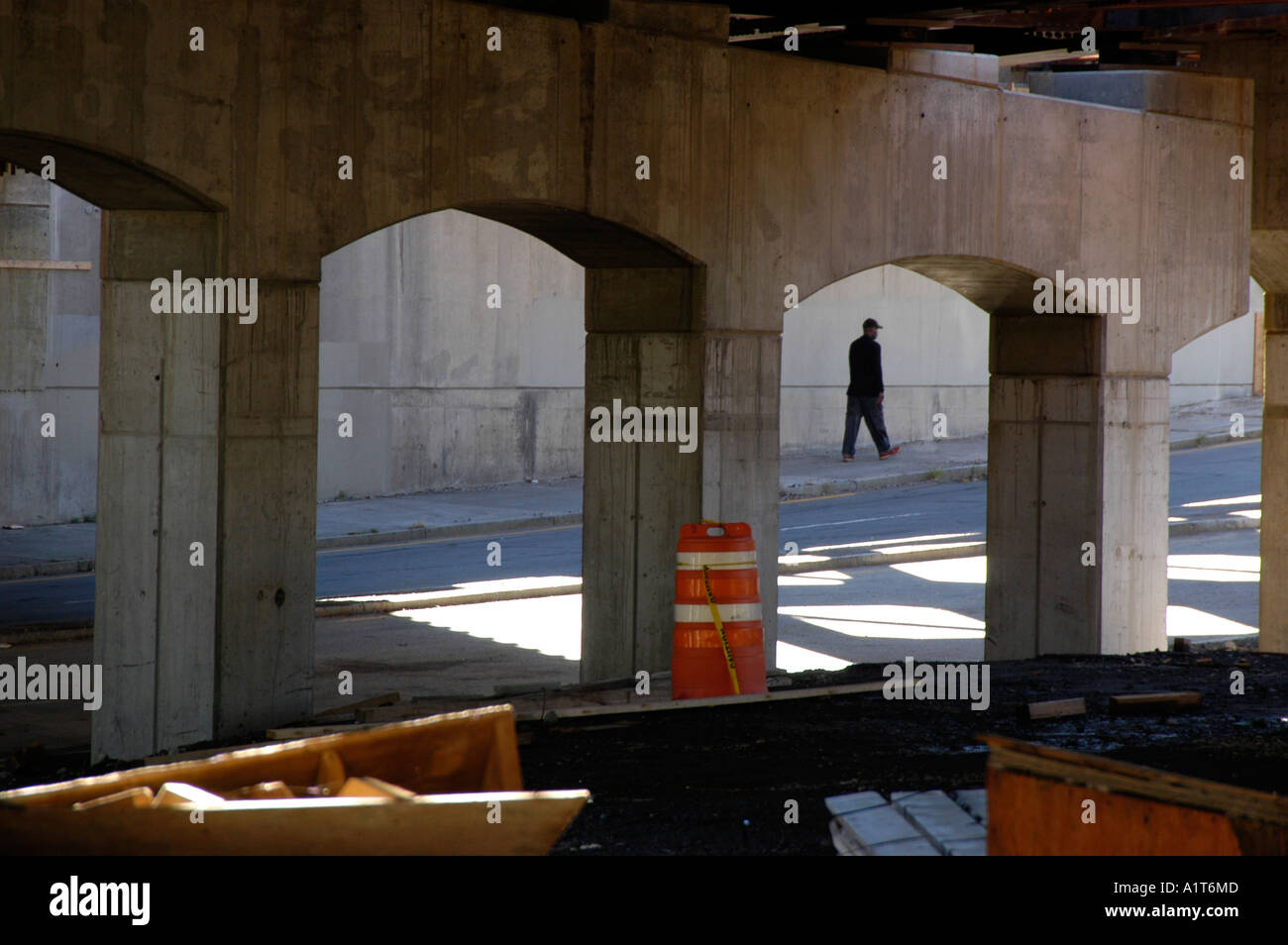 Lone man in shadow hi-res stock photography and images - Alamy
