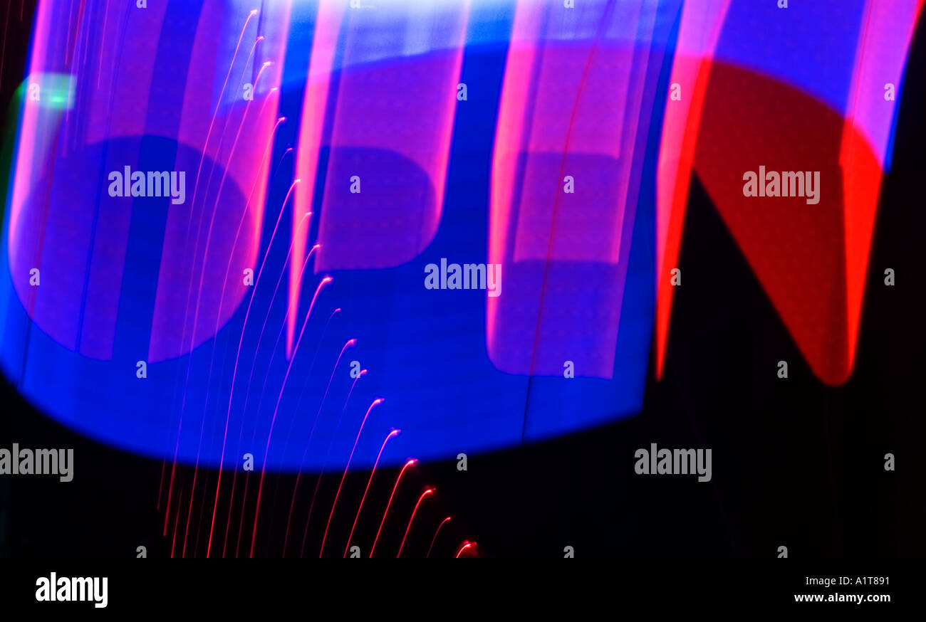 A red blue and pink blurred neon sign with the word Open Stock Photo ...
