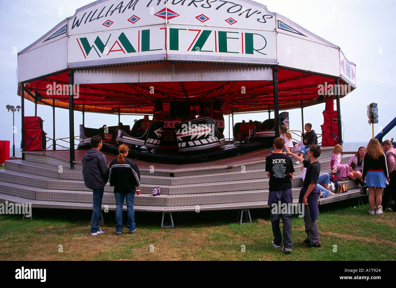 Waltzer fun fair ride hi-res stock photography and images - Alamy