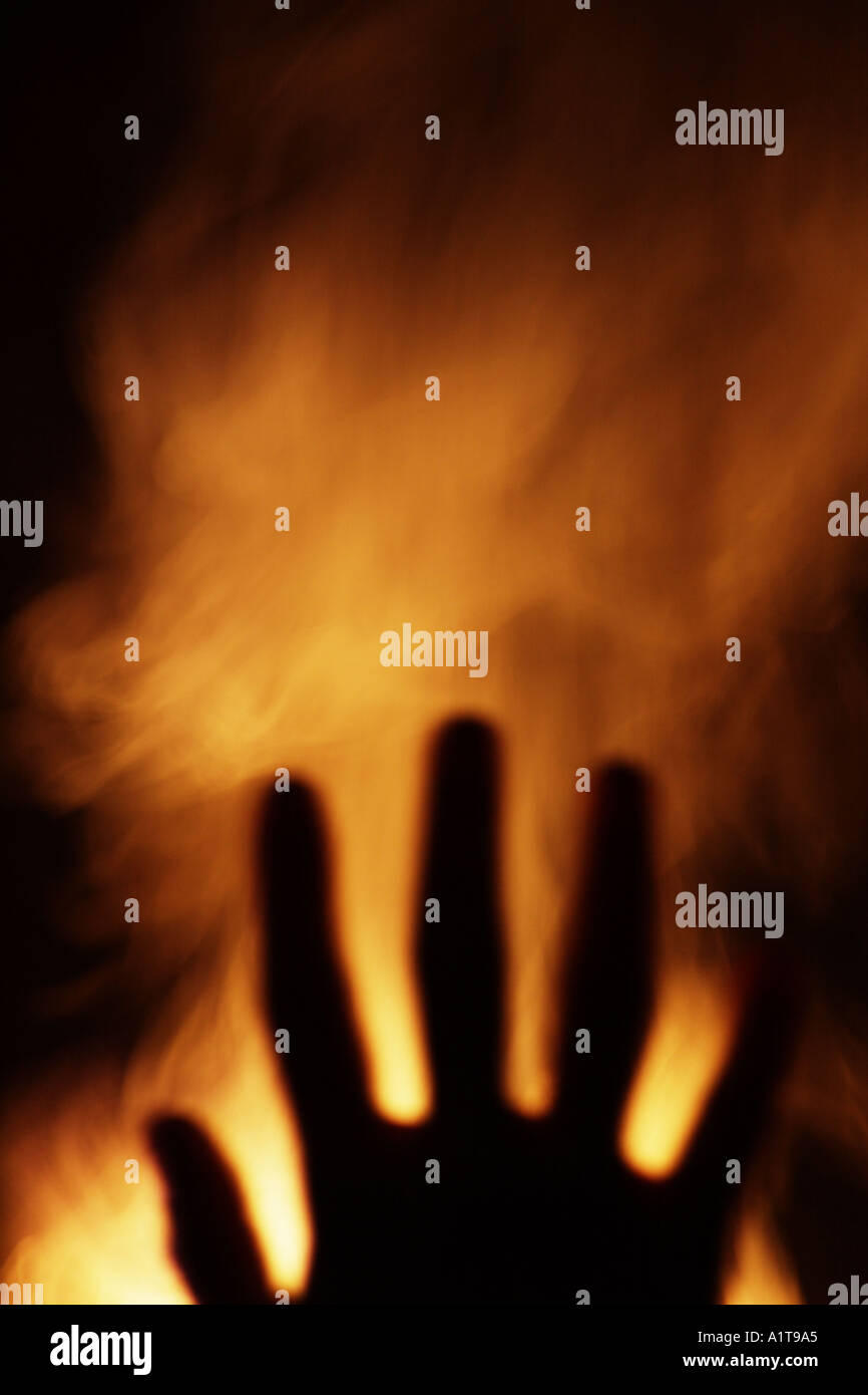 Hand and smoke Stock Photo - Alamy