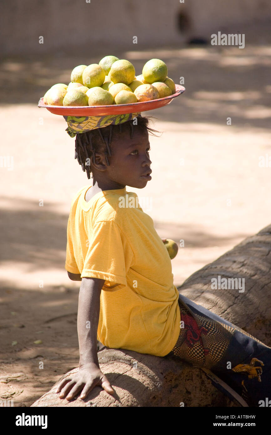 Girl selling oranges in the town of San Mali West Africa Stock Photo ...