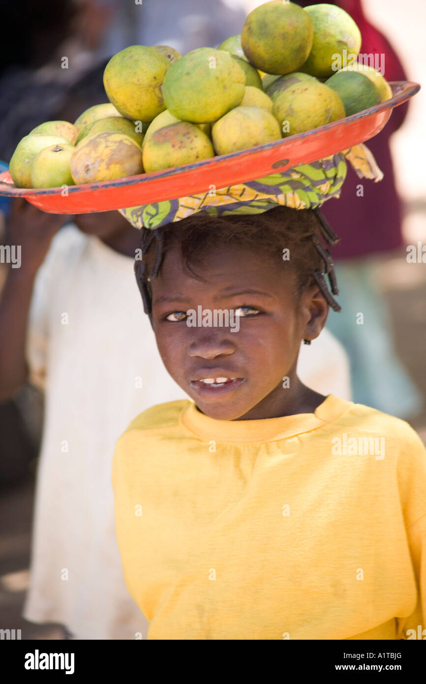 Girl selling oranges in the town of San Mali West Africa Stock Photo ...