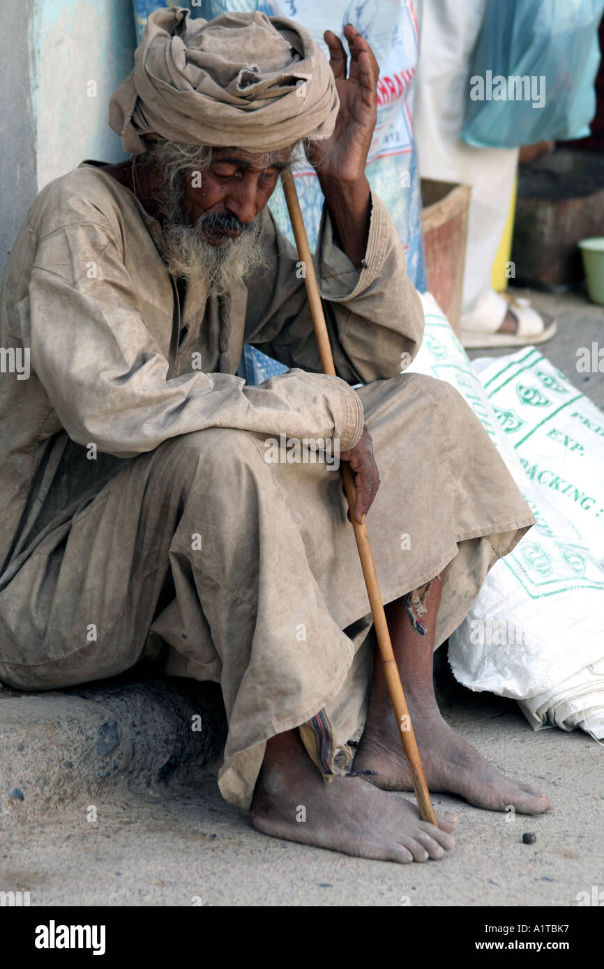 Homeless man clothes hi-res stock photography and images - Alamy