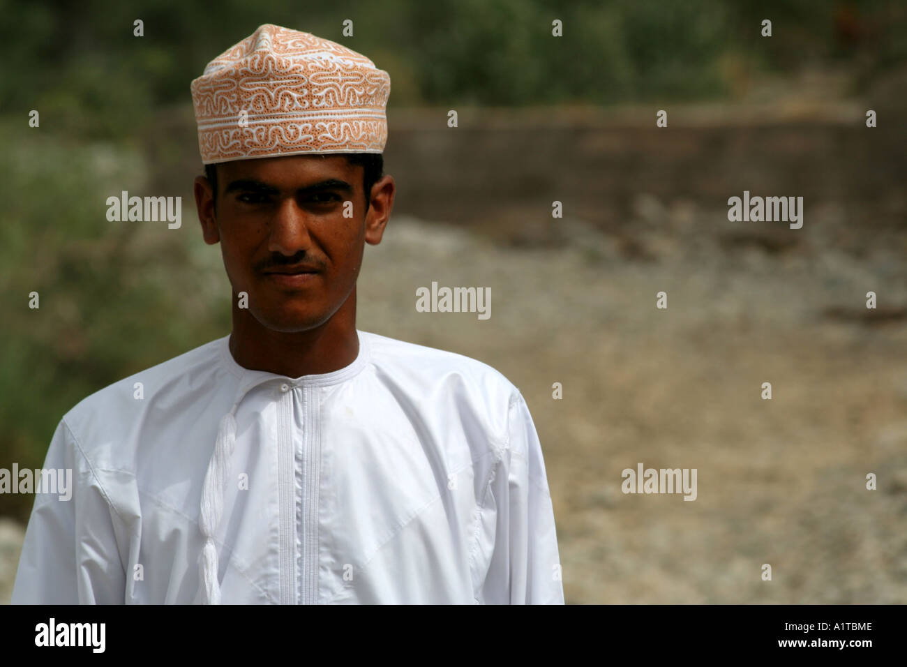 Young omani men in traditional hi-res stock photography and images - Alamy