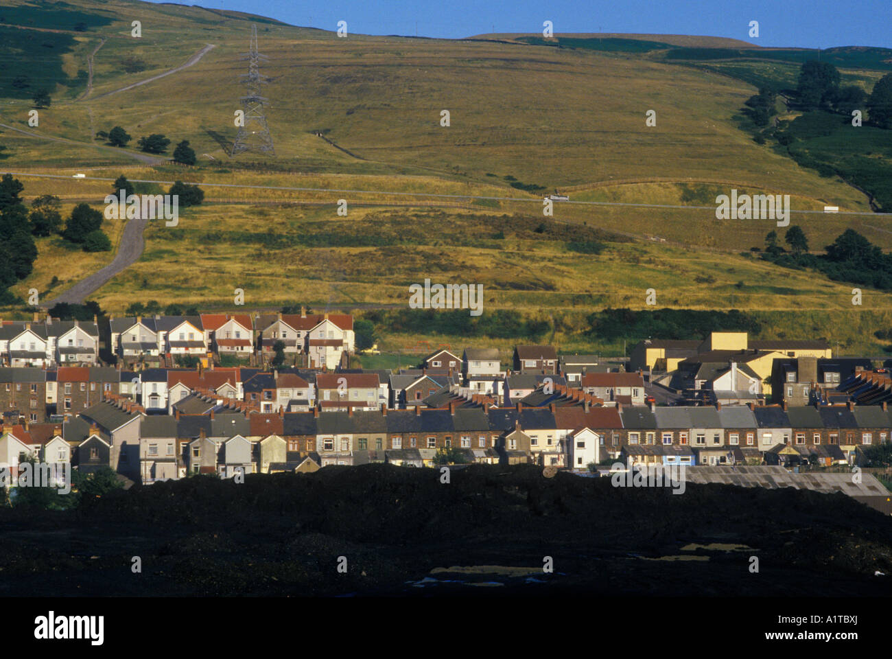 Spoil heap from the coal mine and traditional terrace housing on ...