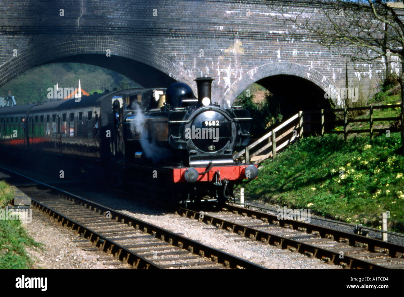 Ex Great Western pannier tank locomotive departs from Weybourne Station ...