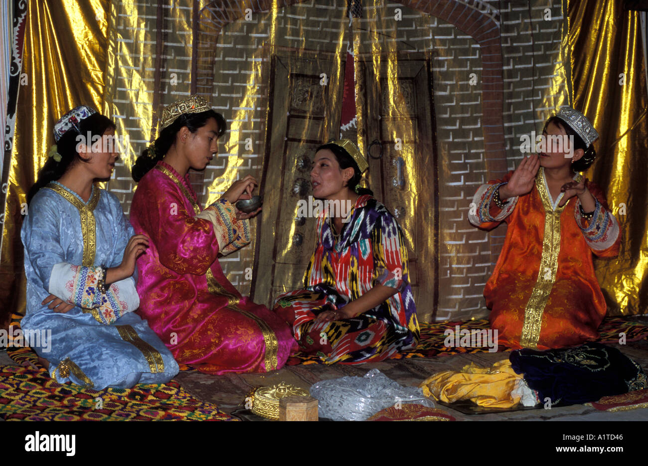 Young Uzbek women acting in play about traditional Uzbek family life ...
