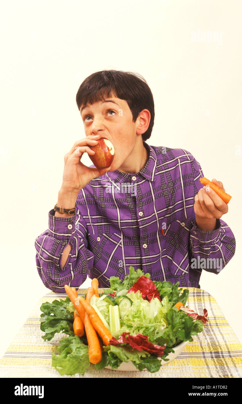 Teenage student eating dinner hi-res stock photography and images - Alamy