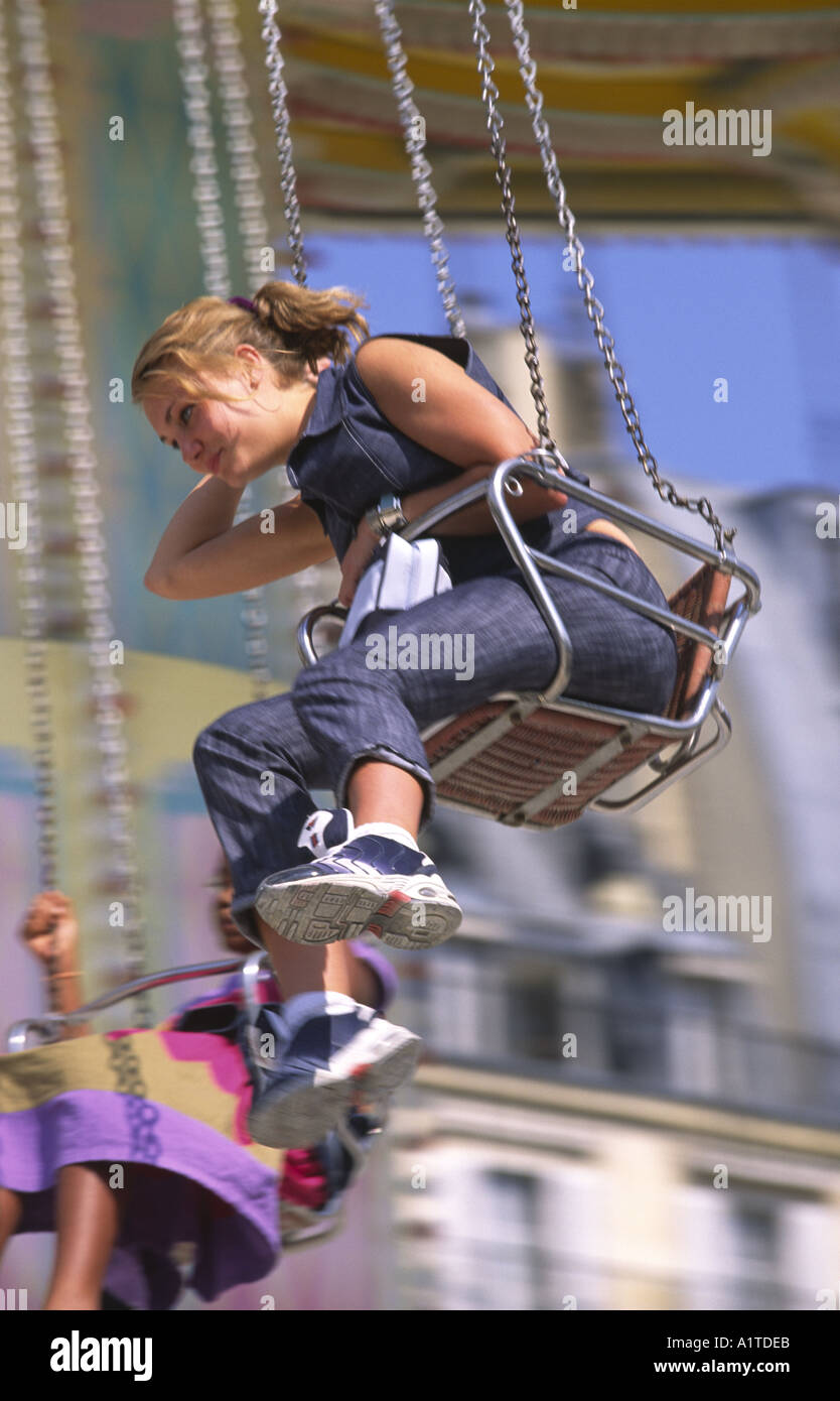 Teenage girl on carousel, Tuilleries, Paris Stock Photo - Alamy