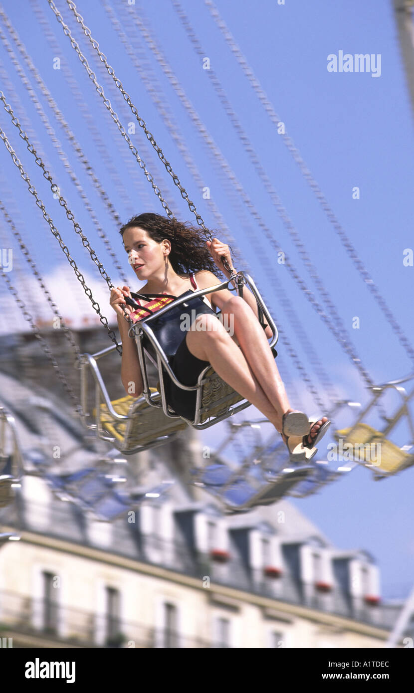 Teenage girl on carousel, Tuilleries, Paris Stock Photo - Alamy