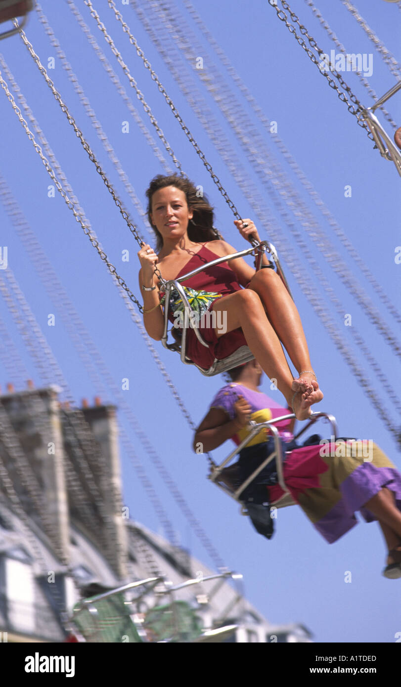 Teenage girl on Carousel, Tuilleries, Paris Stock Photo - Alamy
