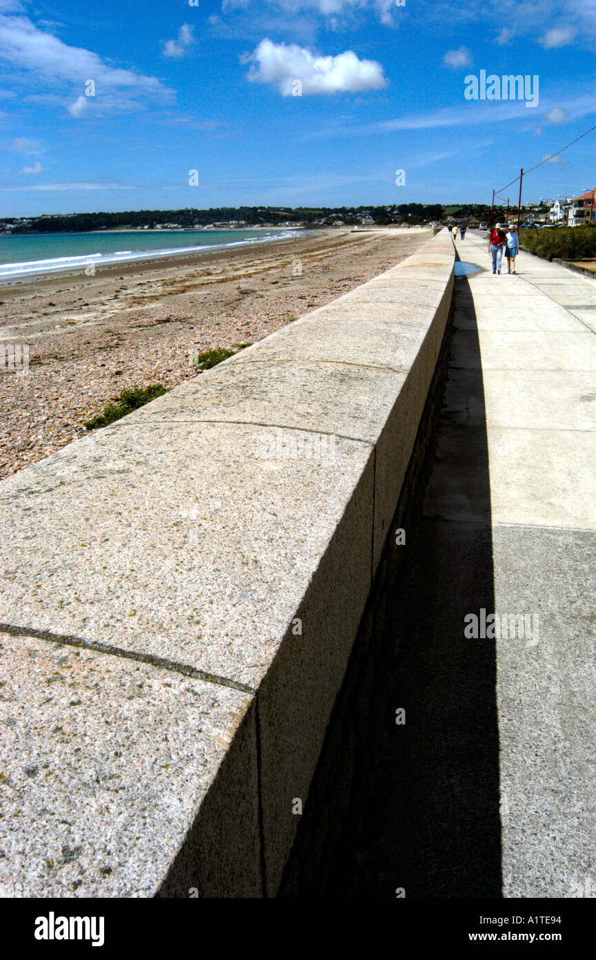 Promenade wall along the sea front road between St Helier and St Aubins ...