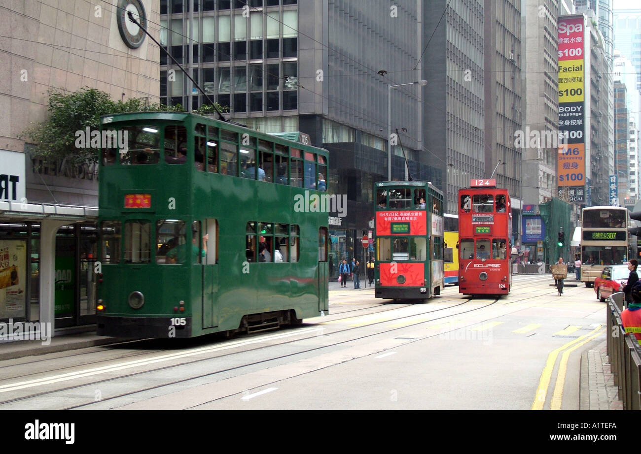 Hong Kong Asia Green and Red double decker trams on tracks powered by ...