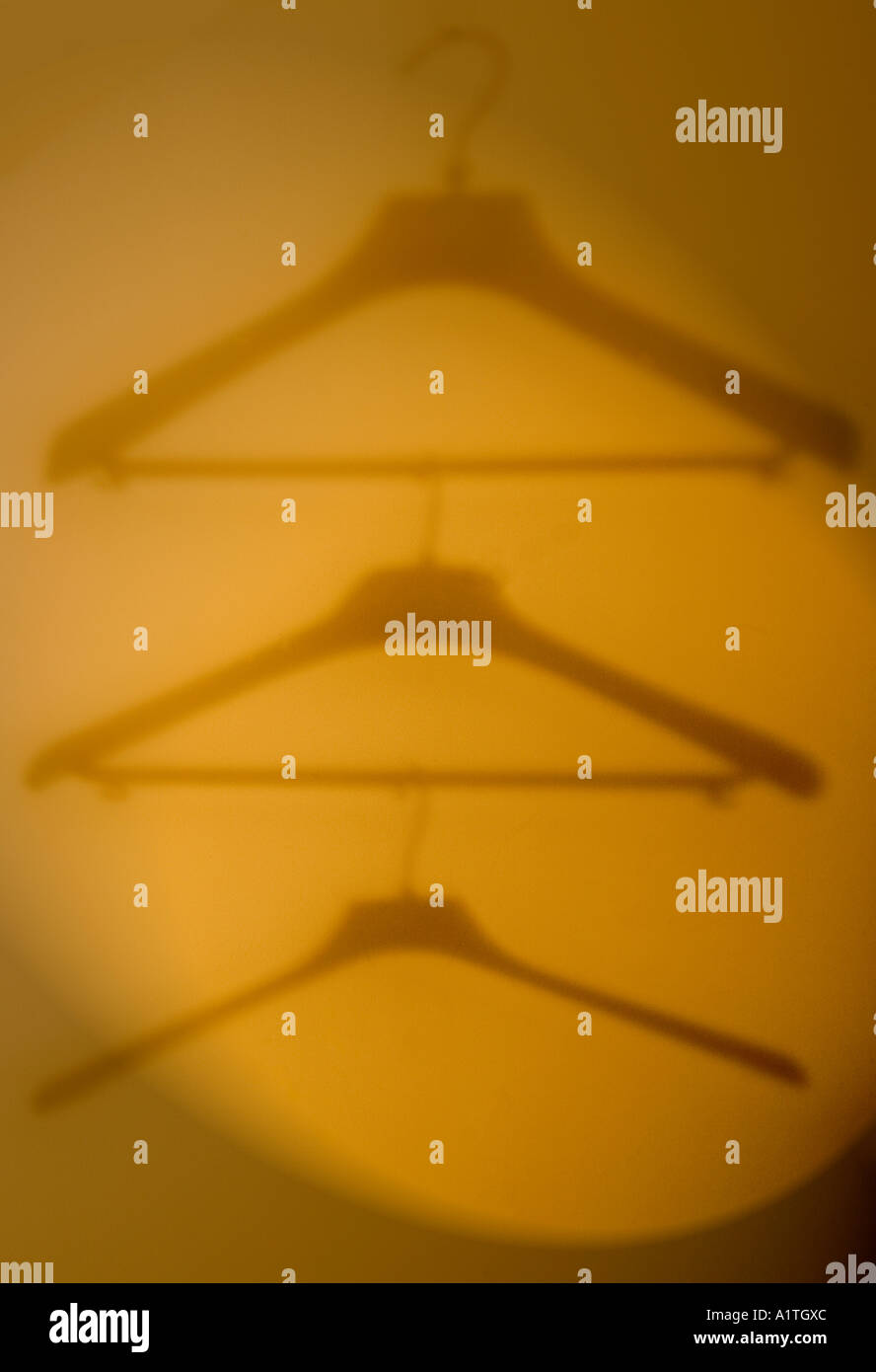 clothes hook shadow and brown light Stock Photo - Alamy