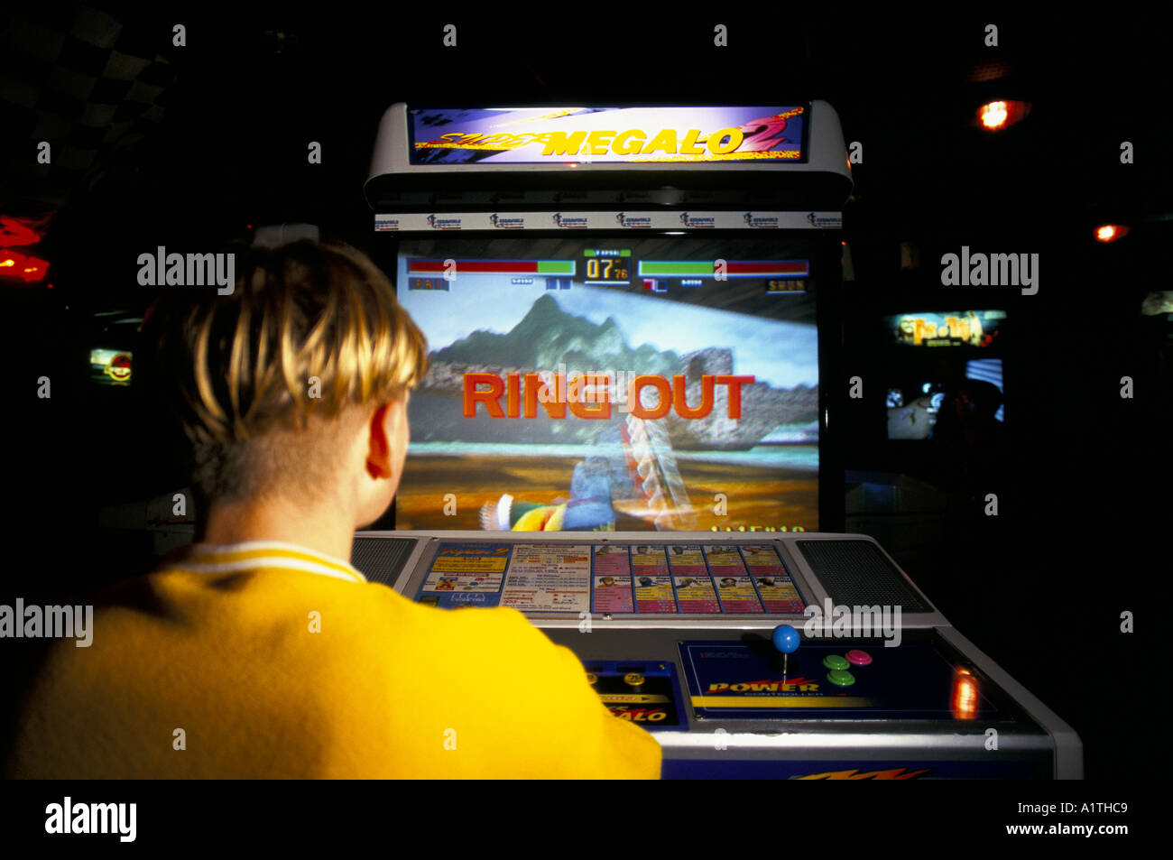 TEEAGER PLAYING COMPUTER GAME AT SEGA WORLD LONDON Stock Photo - Alamy