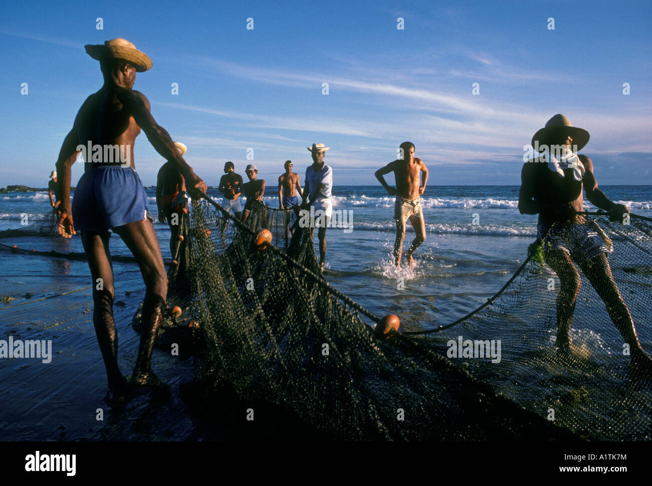 Brazilians Brazilian people person men fishermen fishing with nets ...
