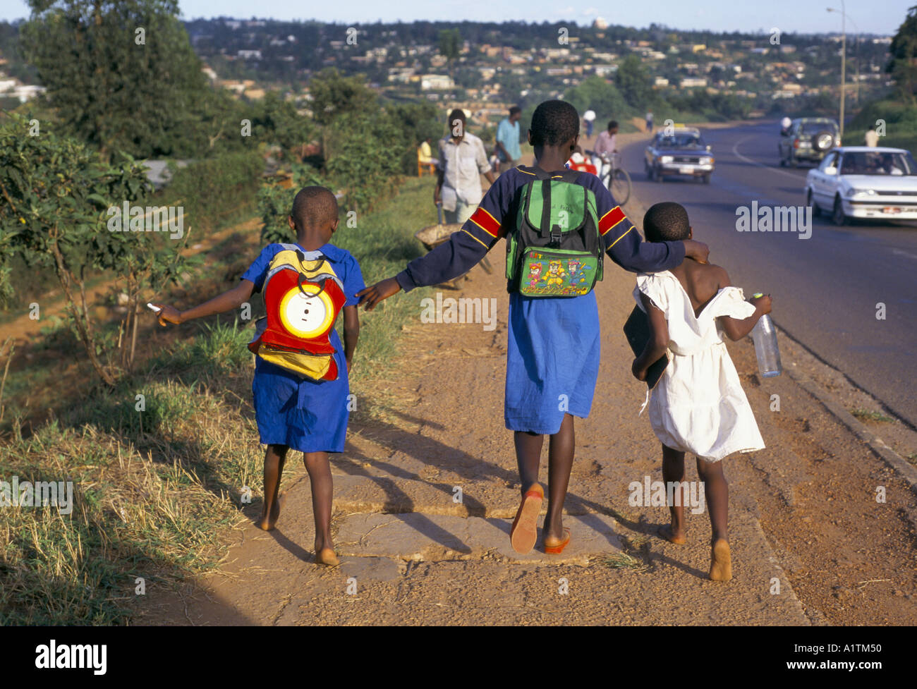 RETURN TO RWANDA MARCH 1995 CHILDREN ON THEIR WAY TO SCHOOL Stock Photo ...