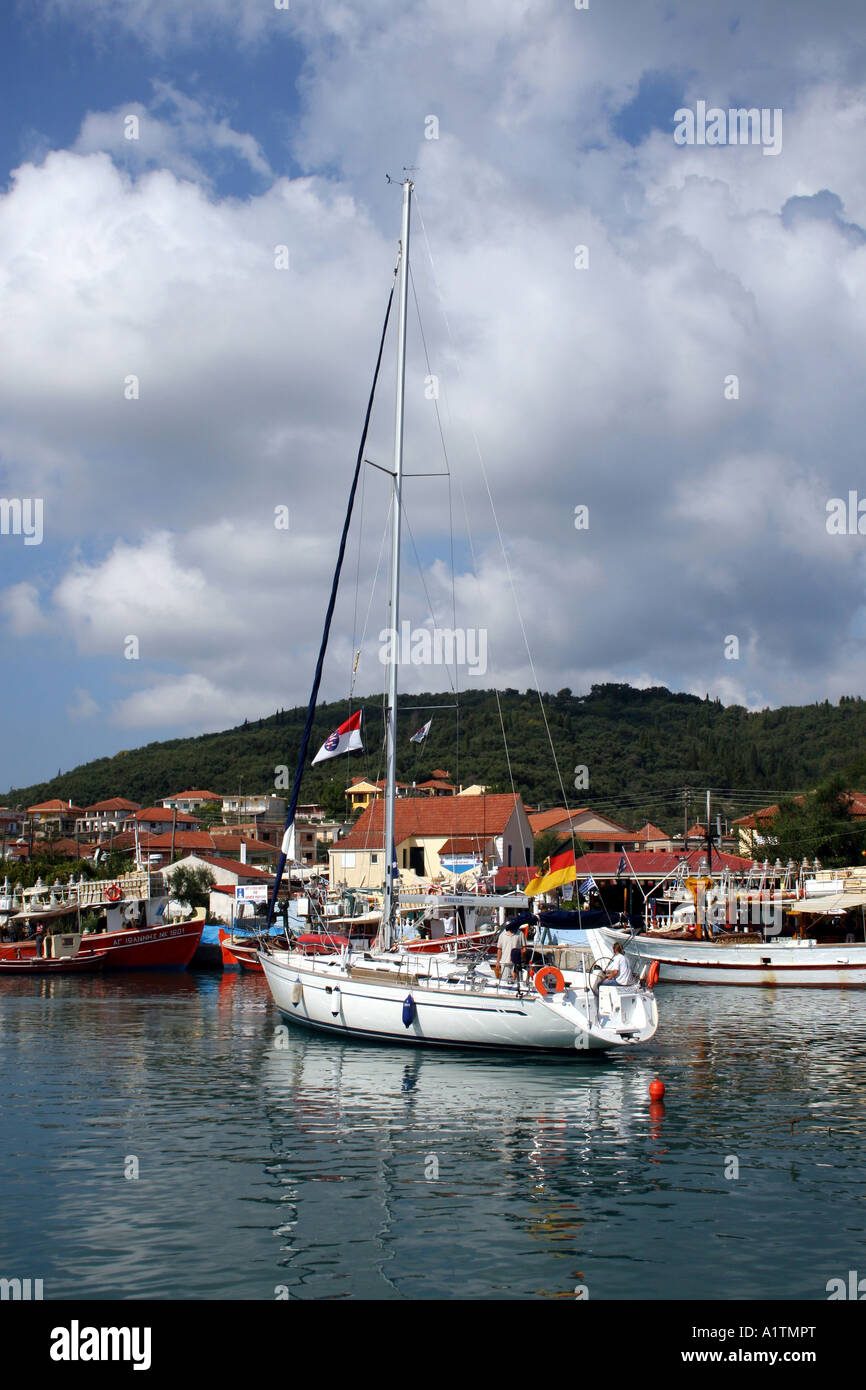 A VISITING YACHT PREPARES TO BERTH AT PETRETI HARBOUR. CORFU. IONIAN ...