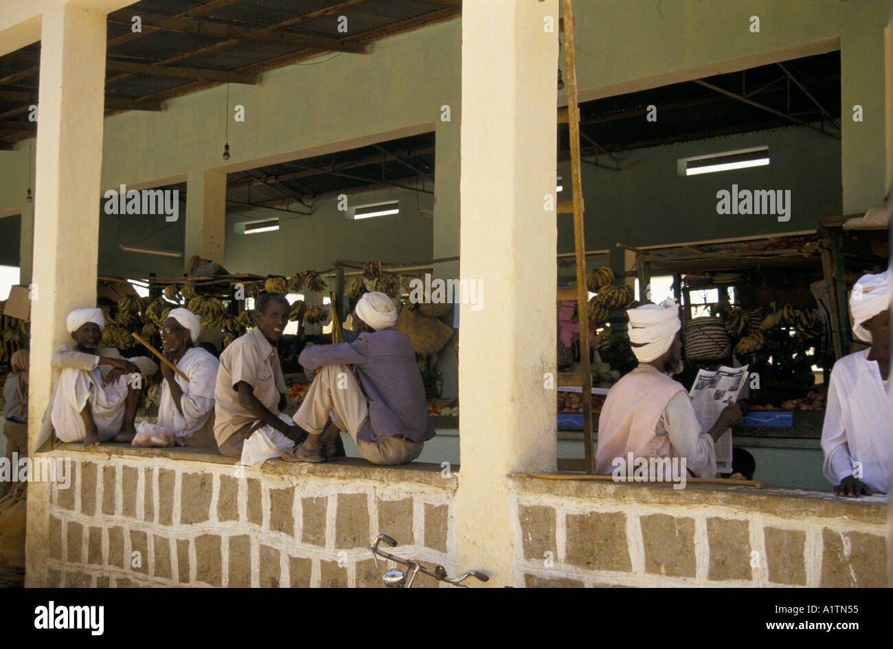 MEN SITTING TALKING READING NEWSPAPER AT KEREN MARKET ERITREA 1993 ...