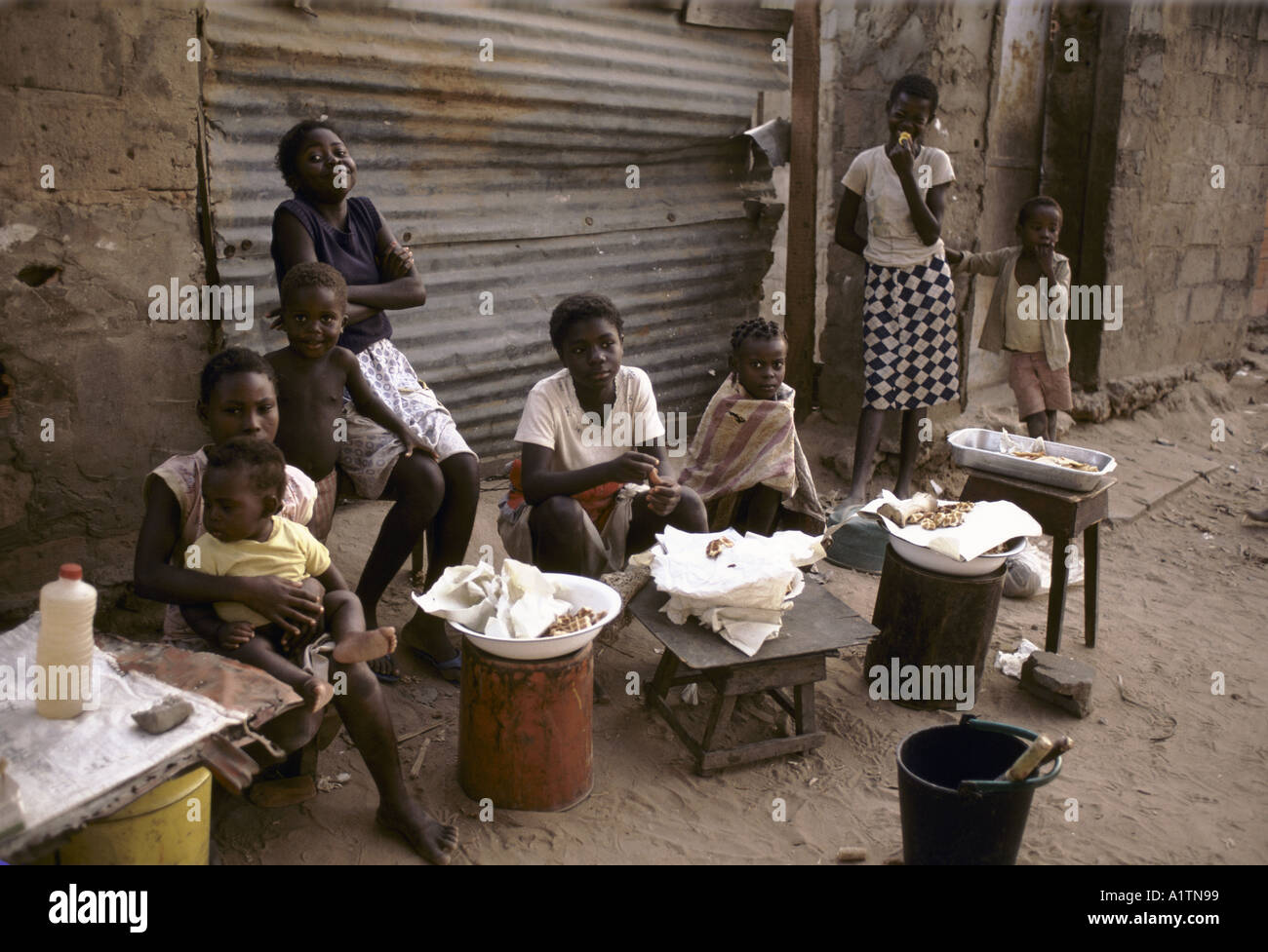 ANGOLA LUANDA SHANTY STREET SELLERS .WOMEN AND THEIR CHILDREN SELLING ...