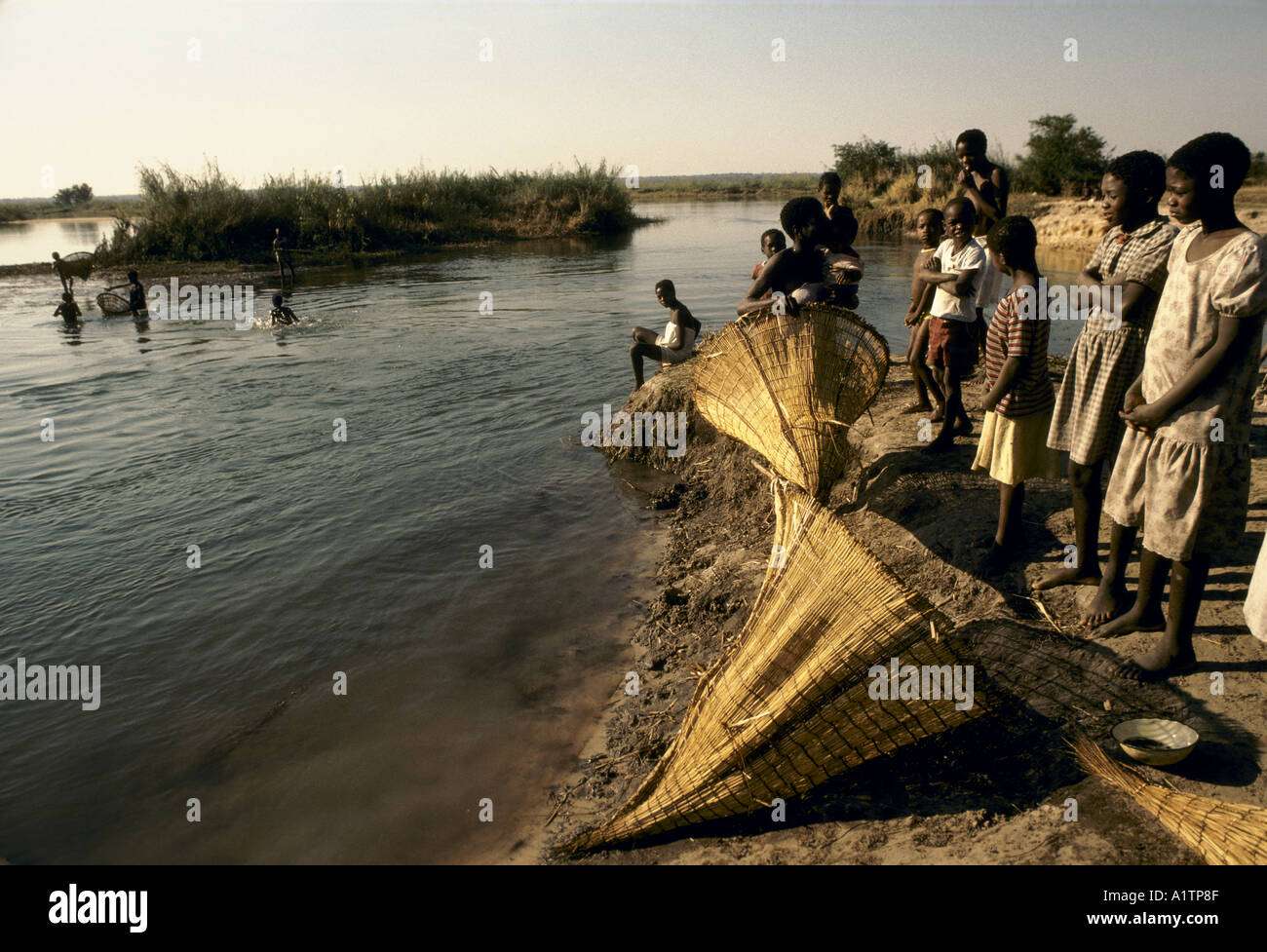 LOCALS USING RUNDU FISHING NETS NAMIBIA Stock Photo - Alamy