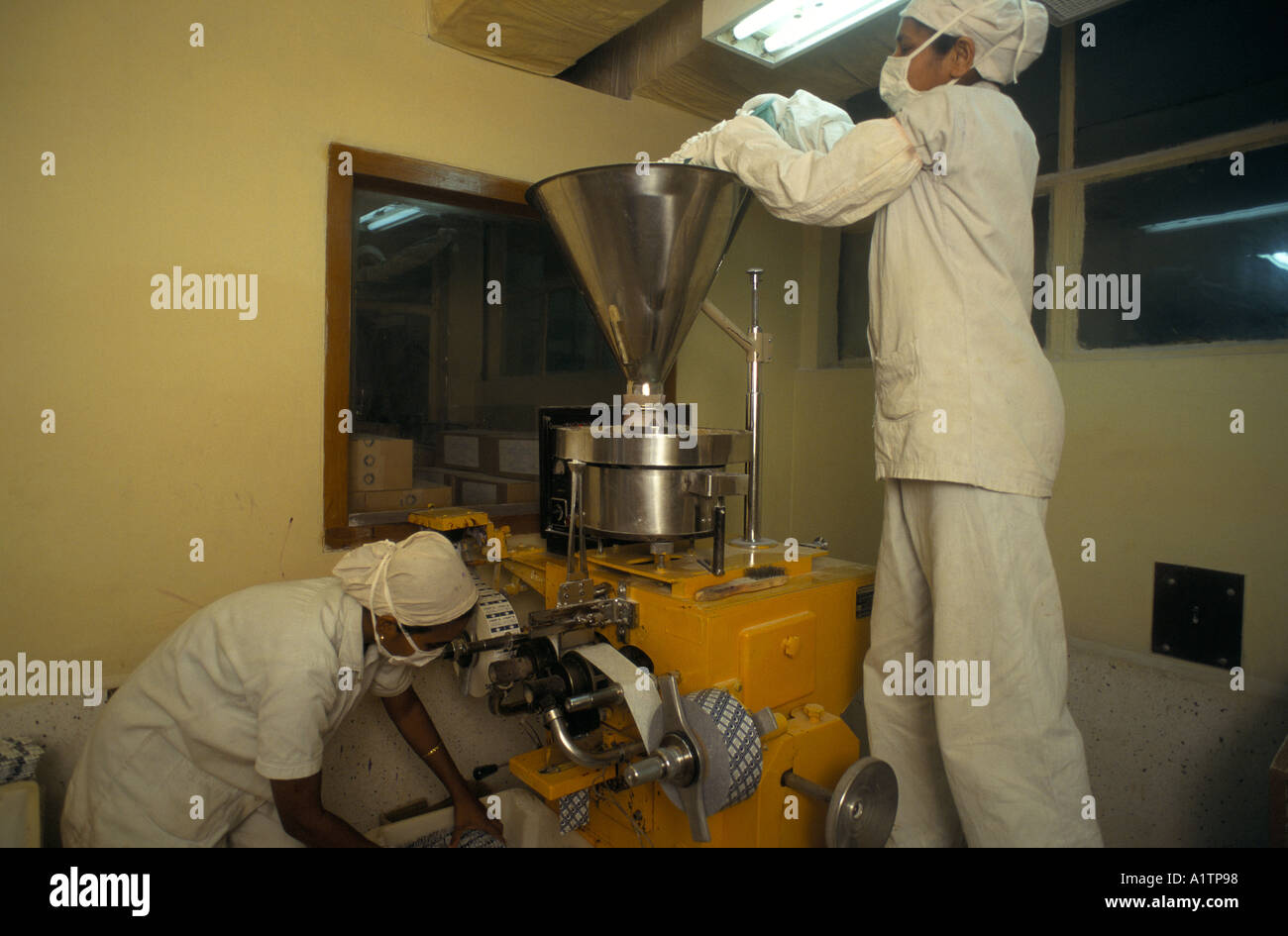 WORKERS LOADING MACHINE.PHARMACEUTICAL PRODUCTION FACTORY IN SAVAR ...