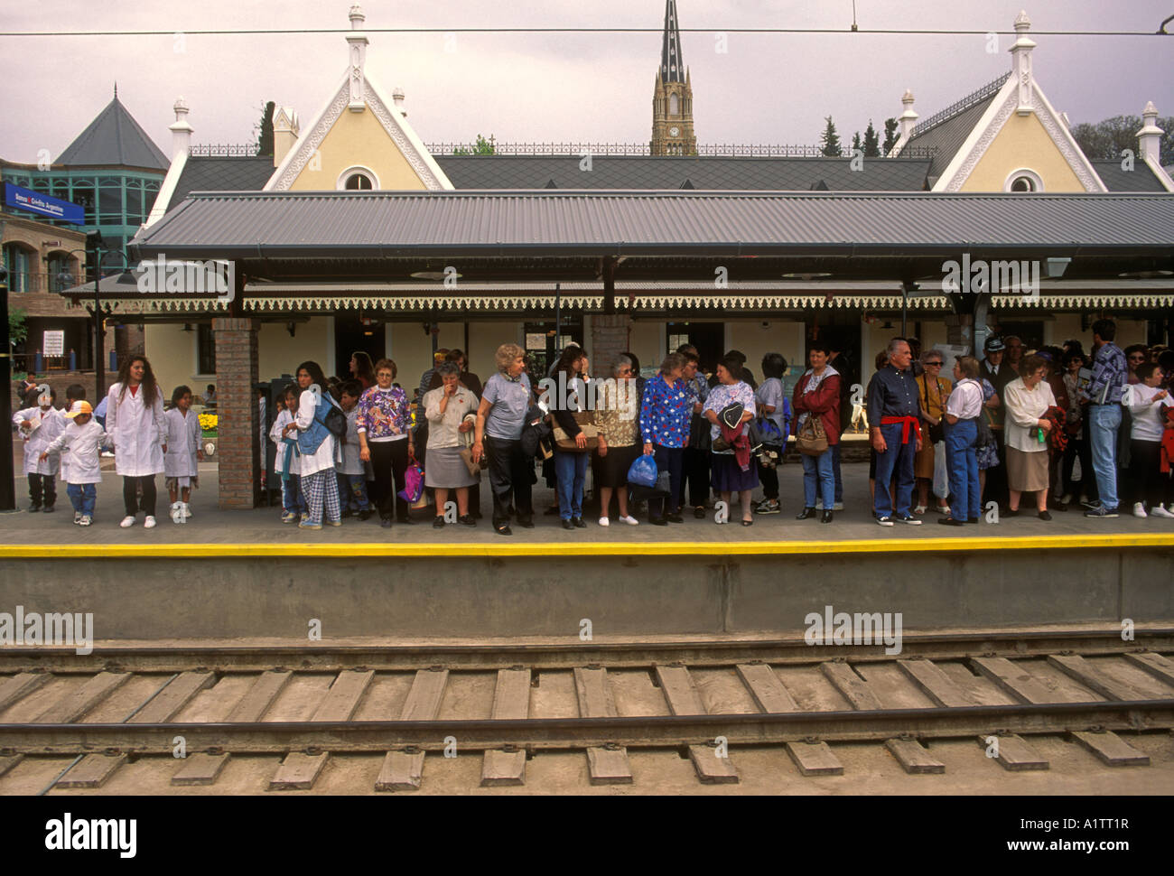 train passengers, train platform, train station, Tren de la Costa, San ...