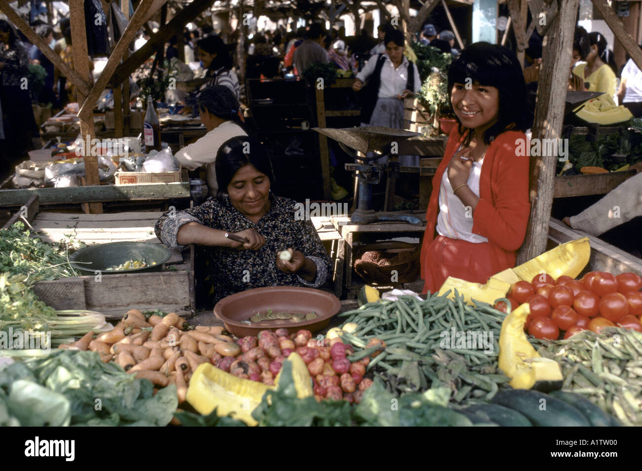 TWO WOMEN WORKING ON A VEGETABLE STALL SHANTY TOWN MARKET LIMA PERU ...