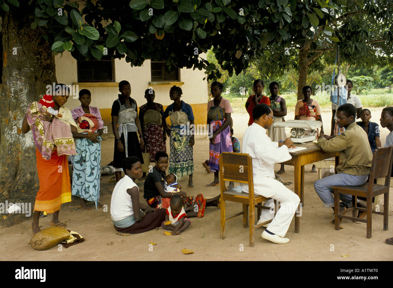 Baby weighing mother scales hi-res stock photography and images - Alamy