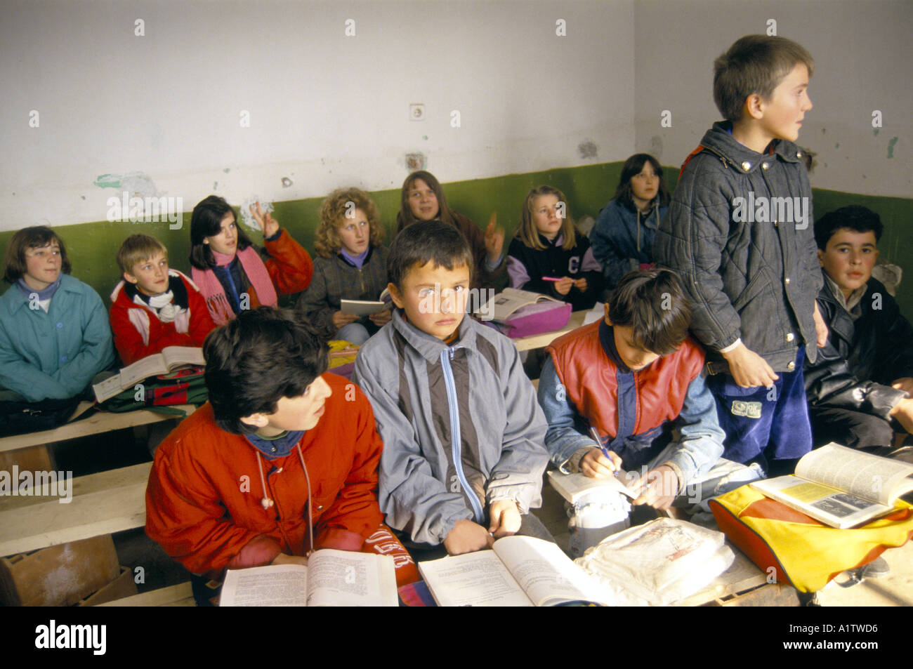 BOY WITH SULKY EXPRESSION IN CLASSROOM OF STUDENTS IN PRIVATE ALBANIAN ...