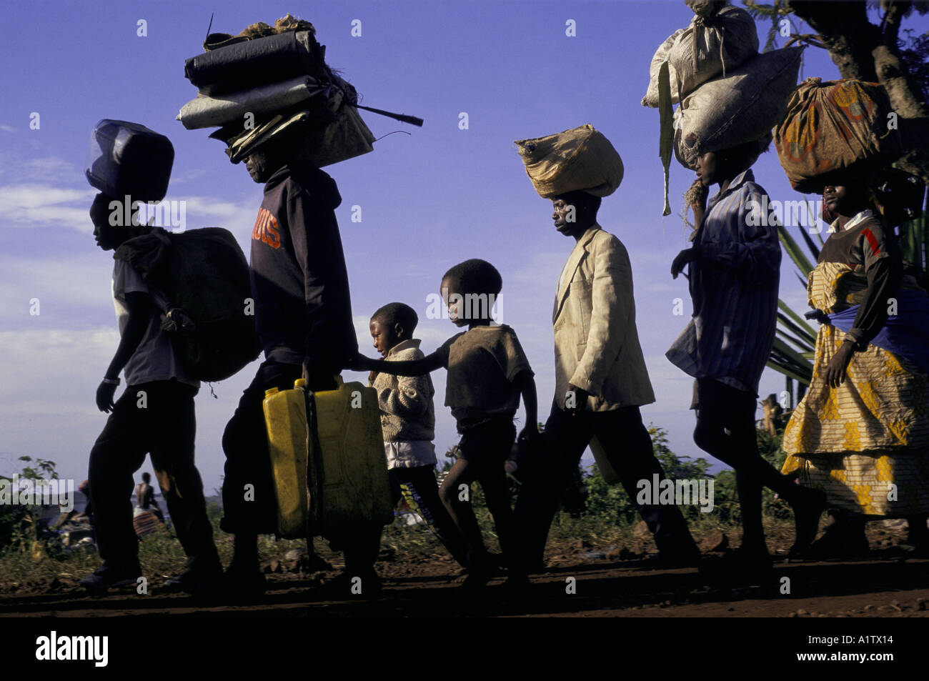 AFTER THE GENOCIDE.RWANDAN REFUGEES ON THE ROAD RETURN FROM GOMA ZAIRE ...