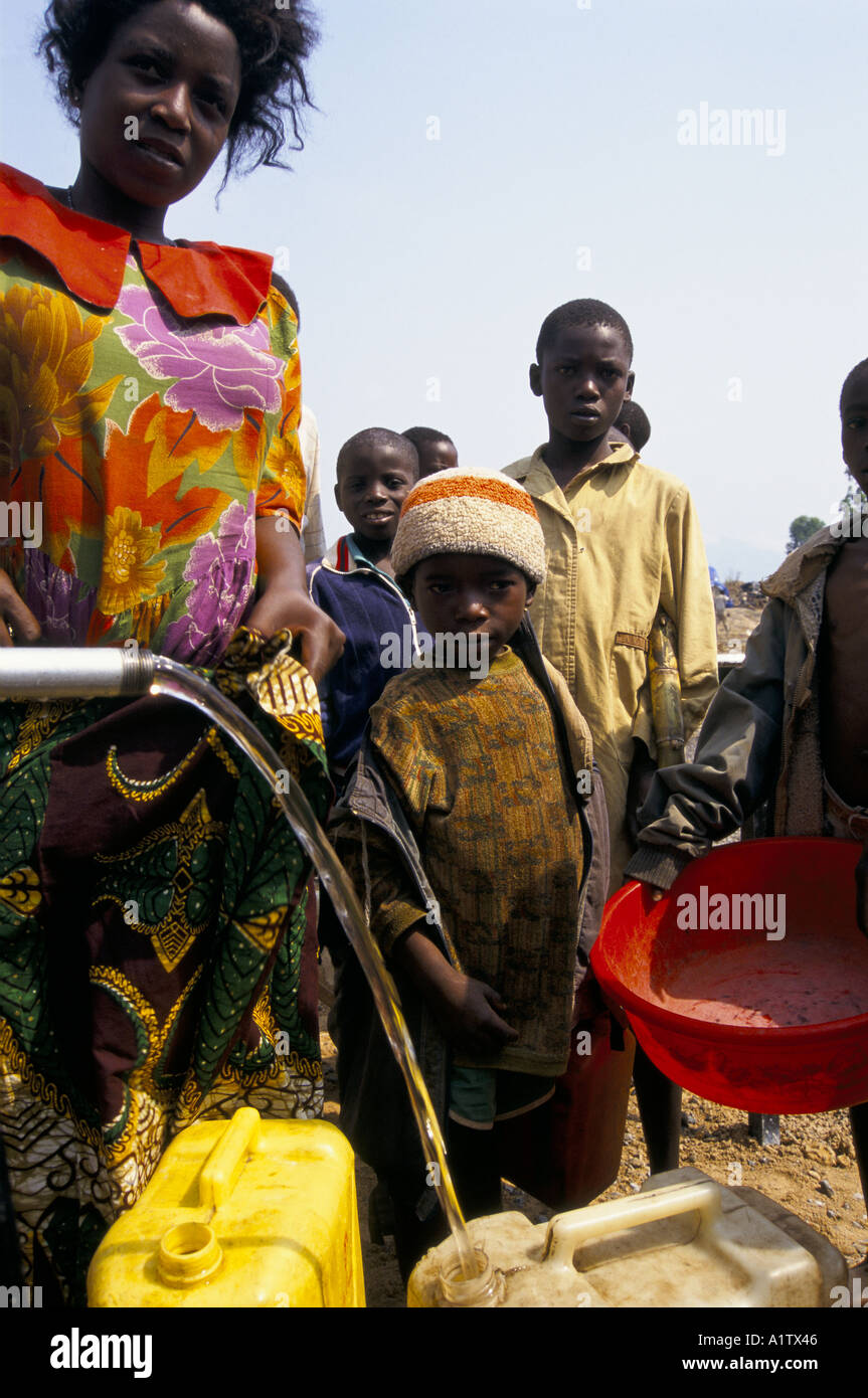After the genocide RWANDAN REFUGEES . KATALE CAMP OXFAM WATER 1994 ...