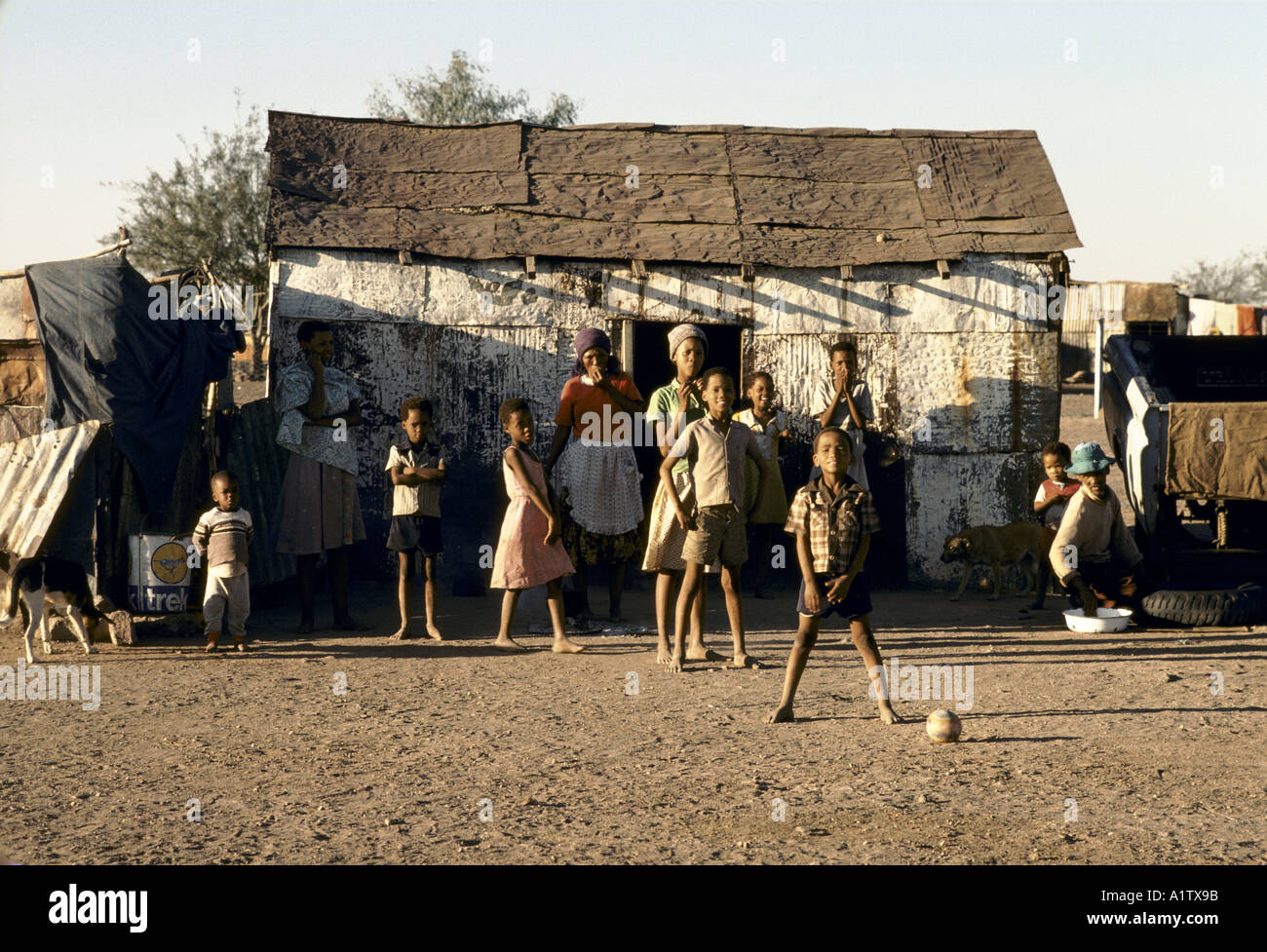 PEOPLE STANDING OUTSIDE HOME NAMIBIA Stock Photo - Alamy