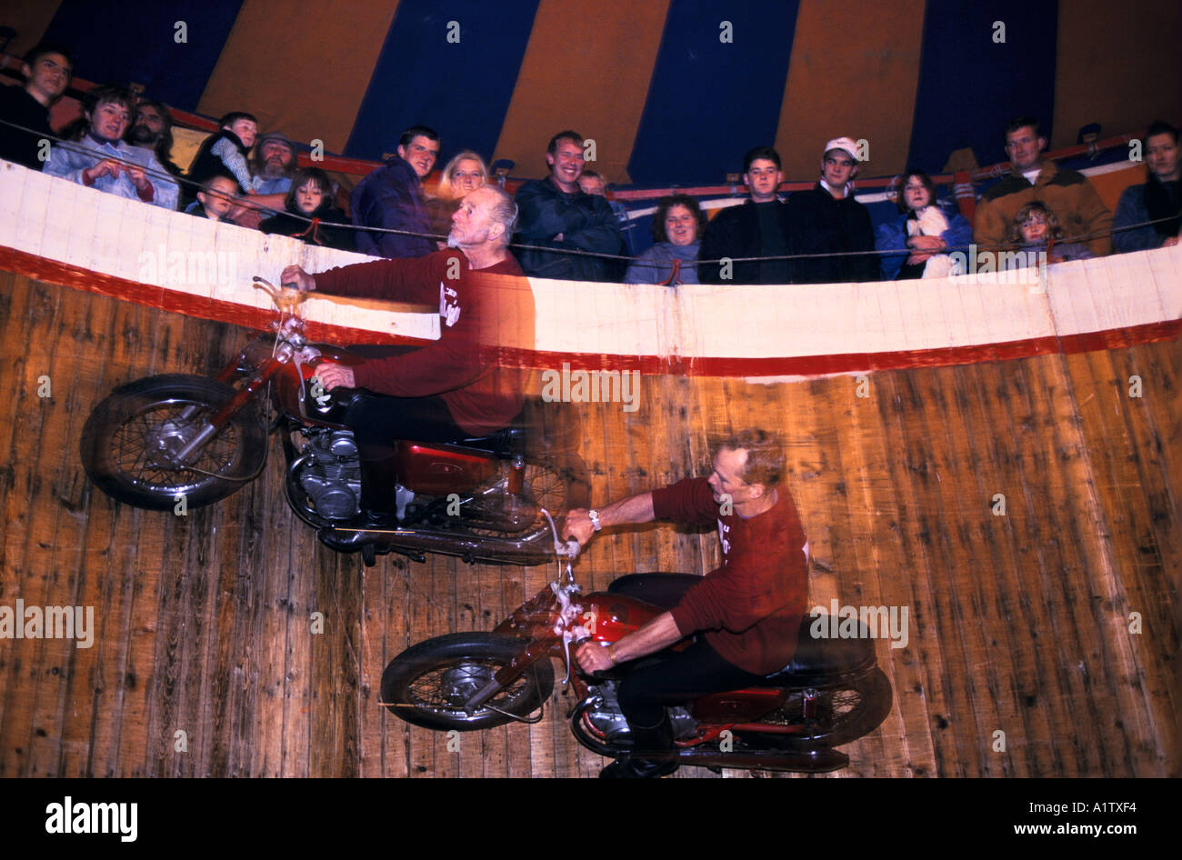 FAIRGROUNDS HULL FAIR WALL OF DEATH 1996,Two men on motorbikes ride ...