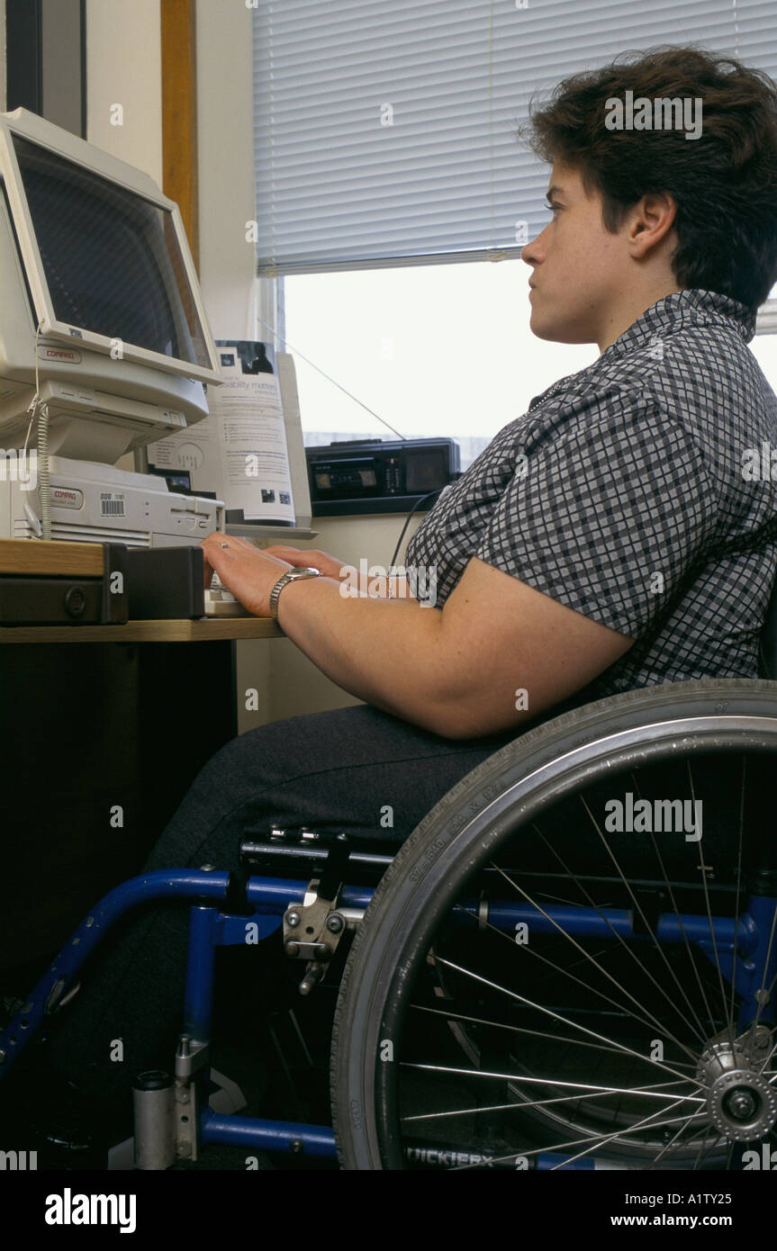 WOMAN OFFICE WORKER IN A WHEELCHAIR Stock Photo - Alamy