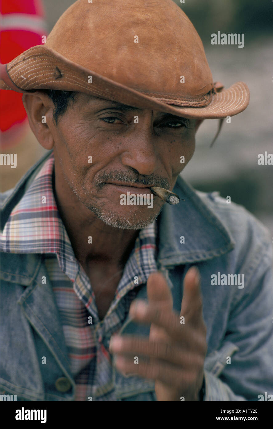 Poor peasant man smoking hand rolled cigarette , North east BRAZIL ...