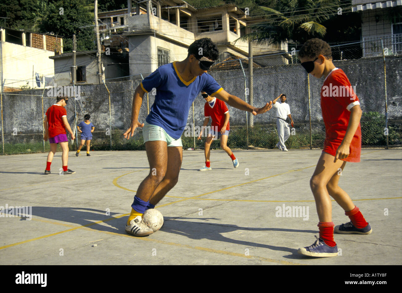 BOYS PLAYING FOOTBALL BRAZIL SOME ARE PARTIALLY SIGHTED SO ALL WEAR ...