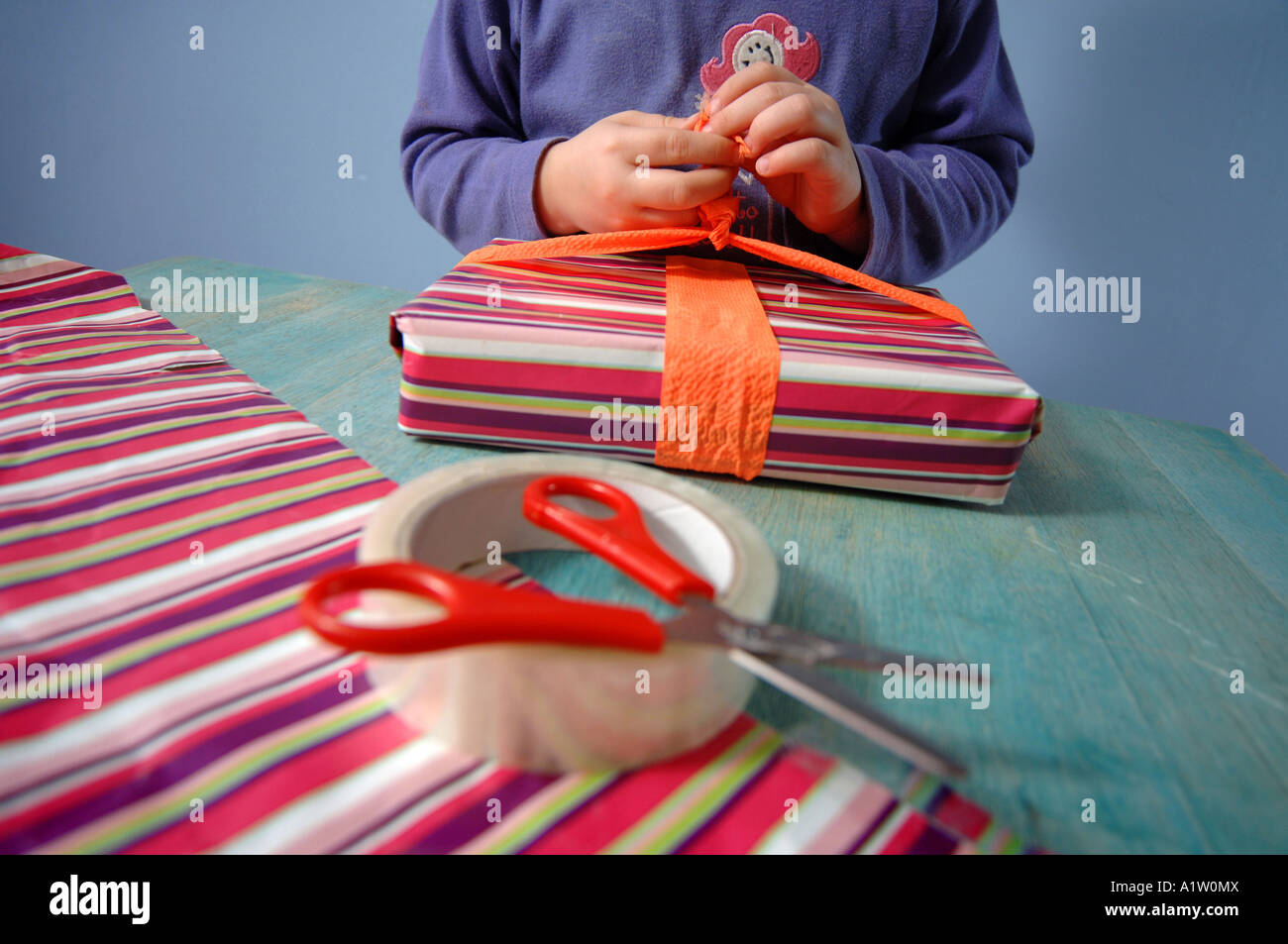 Wrapping presents sellotape hi-res stock photography and images - Alamy