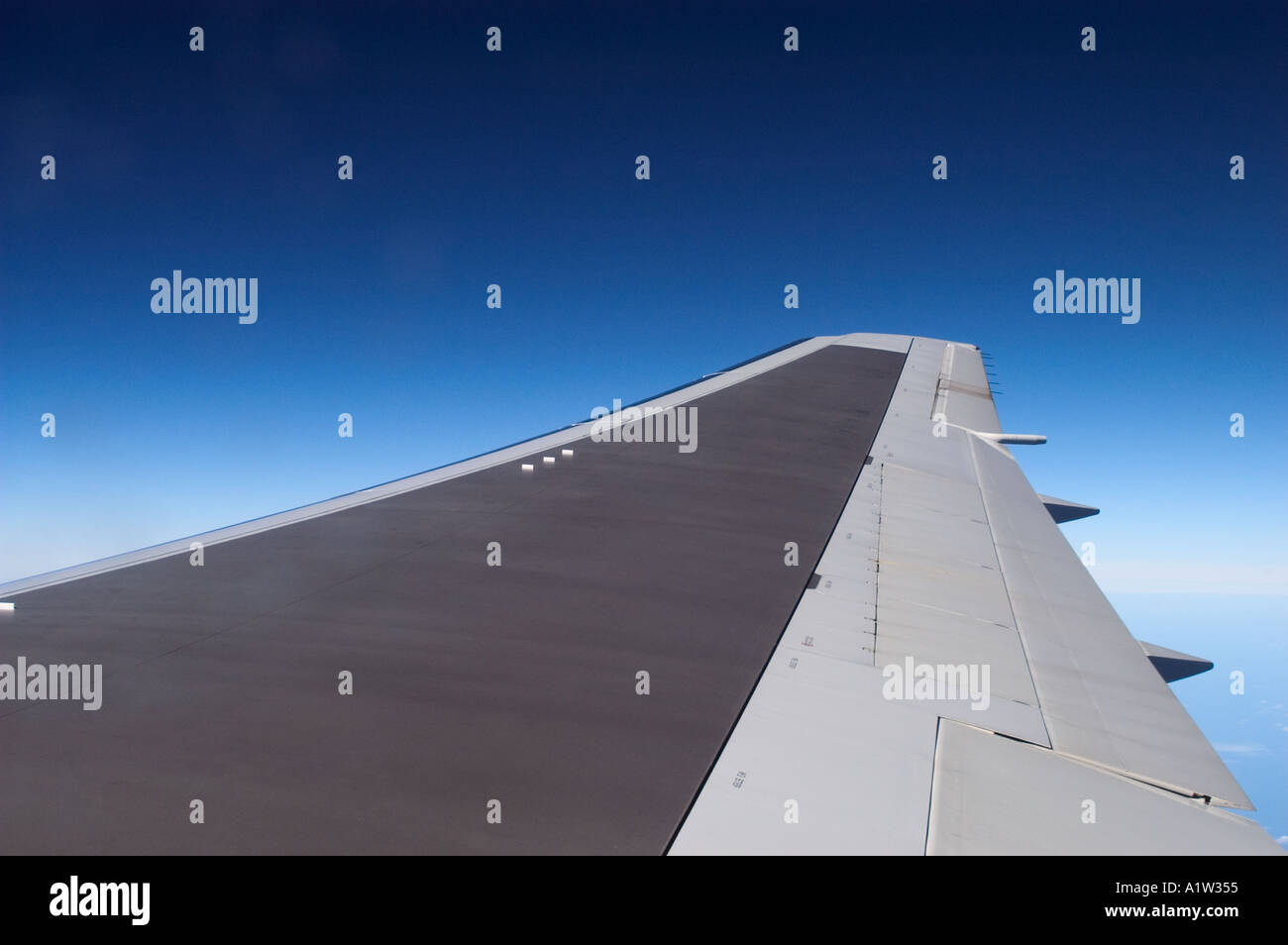 Airplane wing view from window Stock Photo - Alamy