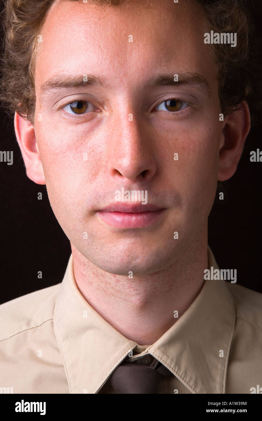 Young man in brown Stock Photo - Alamy