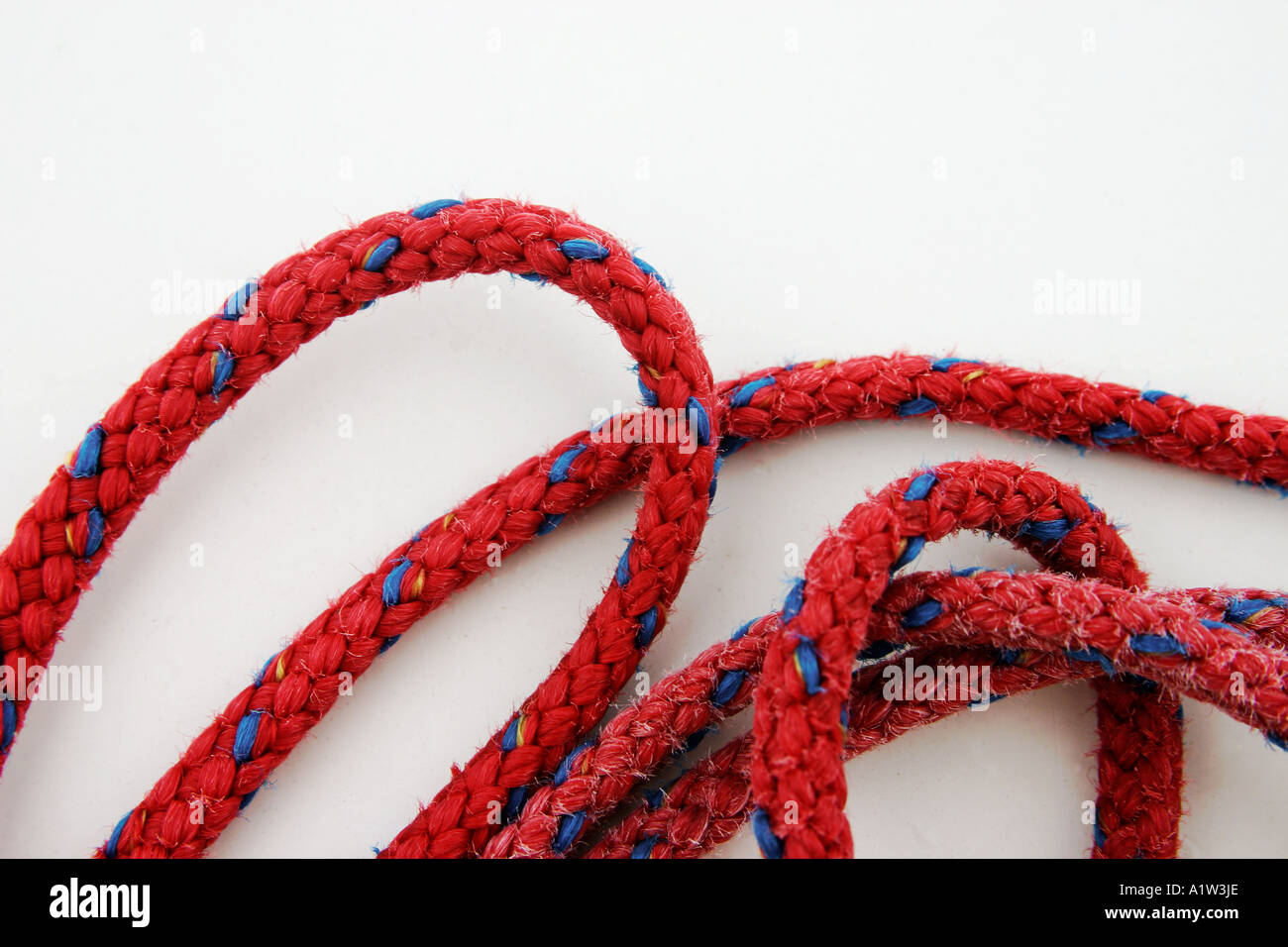 Red tangled rope Stock Photo - Alamy