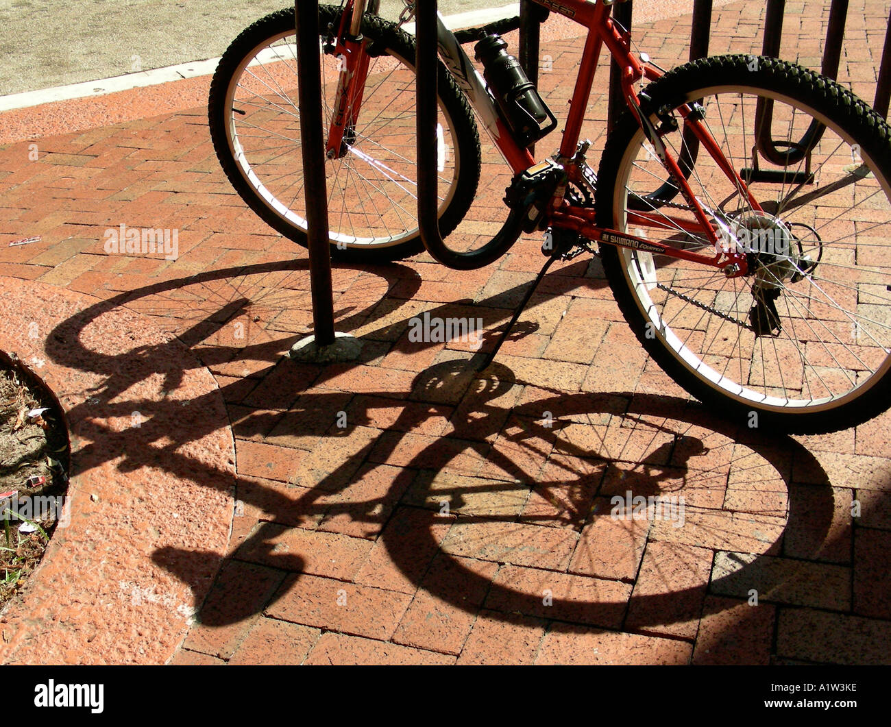 Bicycle and its shadow Stock Photo - Alamy