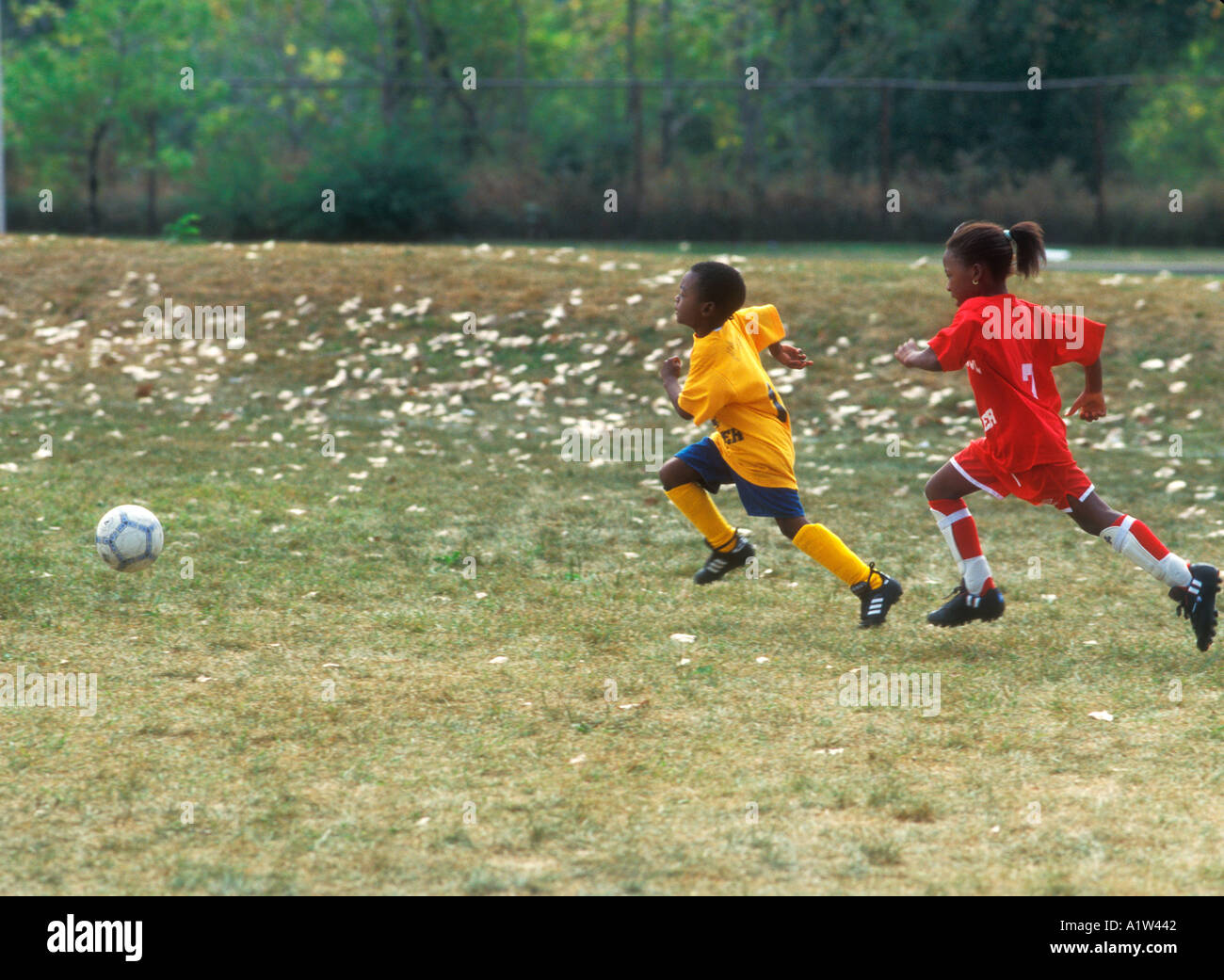 African boy girl playing soccer hi-res stock photography and images - Alamy