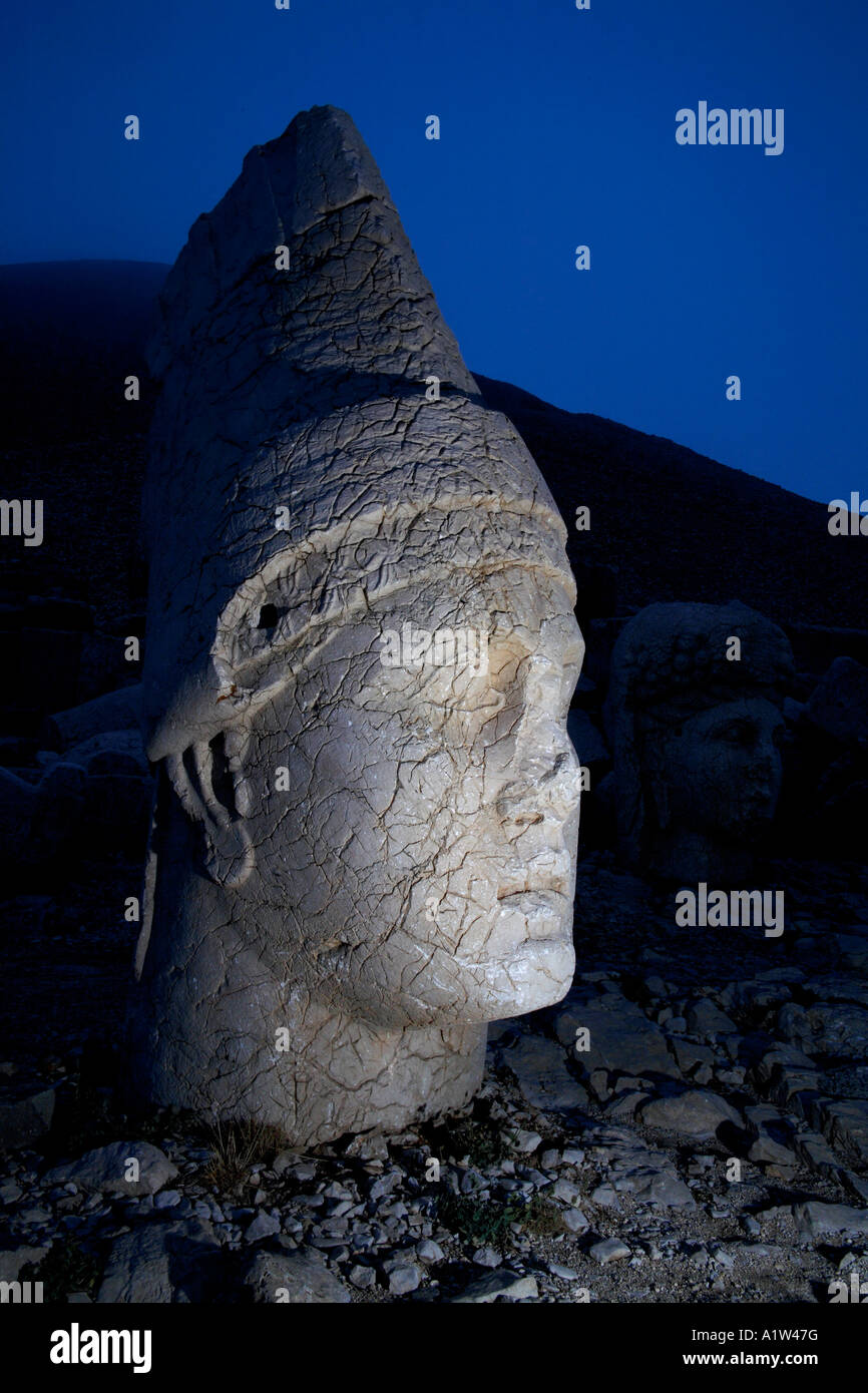Statue head at Mount Nemrut at twilight, Anatolia, Turkey Stock Photo ...